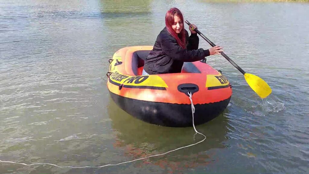 Mona gets wet in the rubber boat - Girls in Wet Clothes