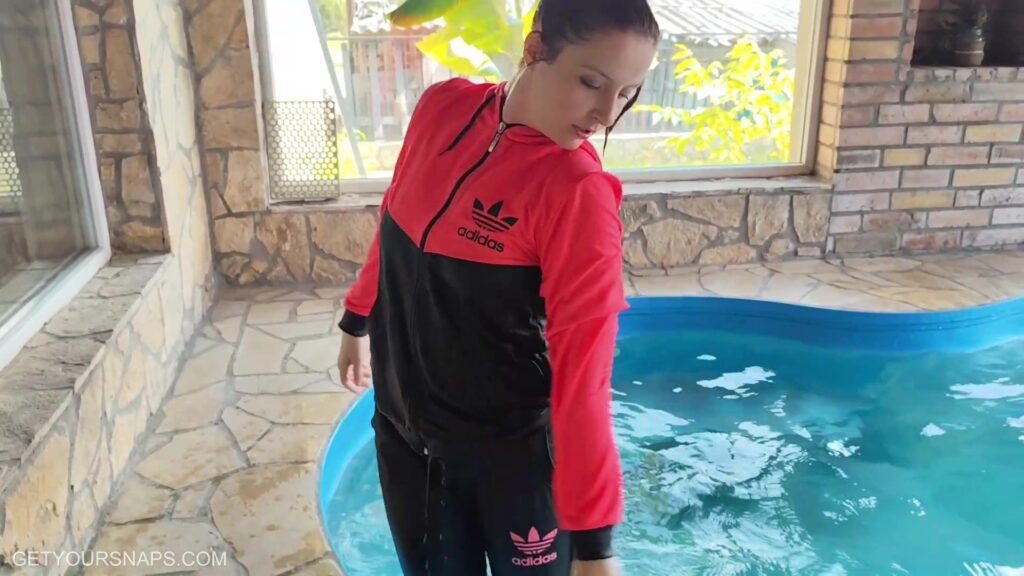 Vicky gets wet in her Adidas track suit - Girls in Wet Clothes
