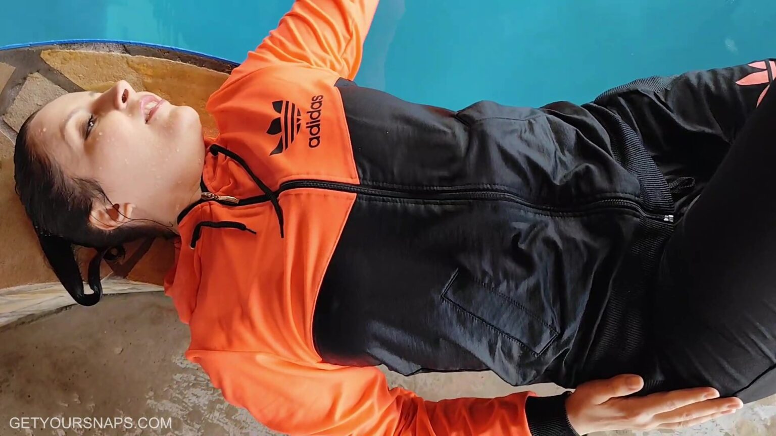Vicky gets wet in her Adidas track suit - Girls in Wet Clothes